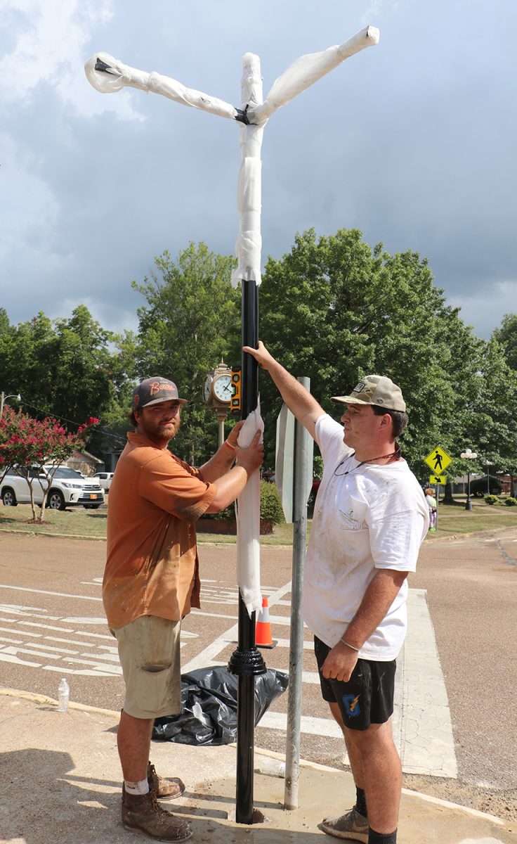 sign installation 2 – The North Mississippi Herald